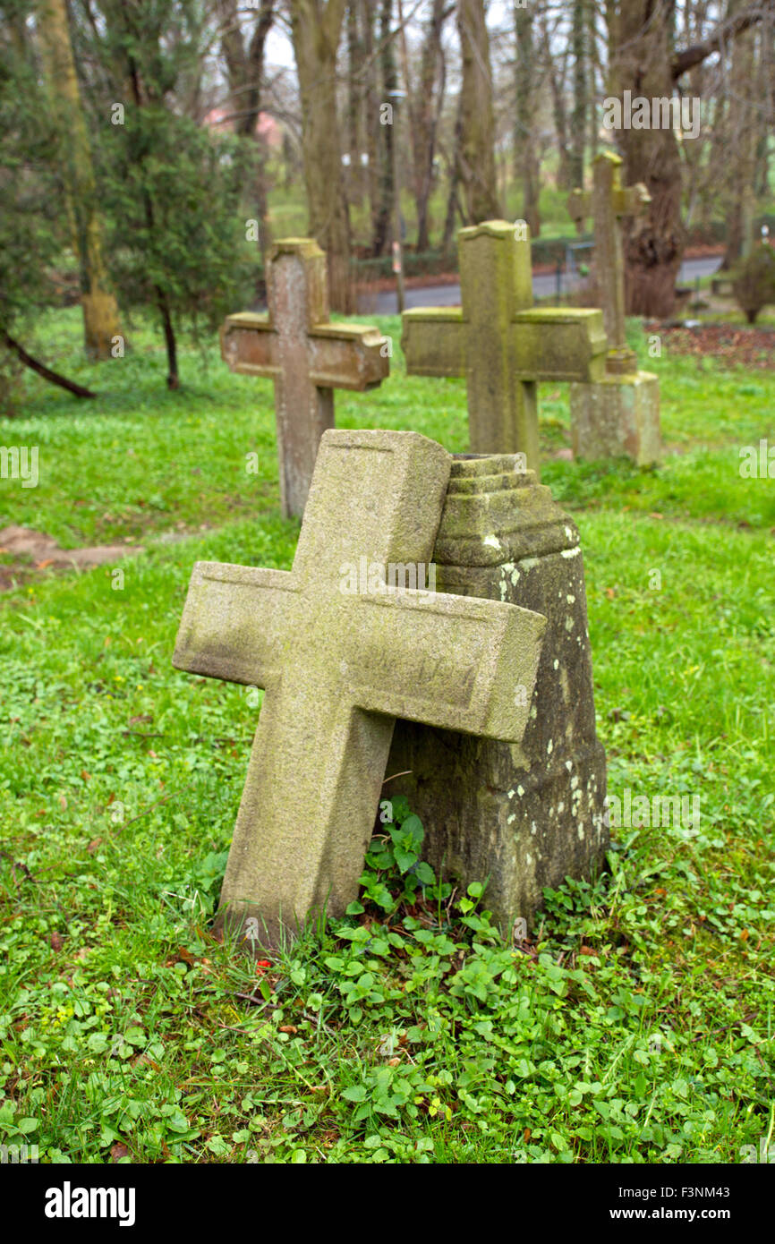 A stone cross on an old graveyard Stock Photo - Alamy