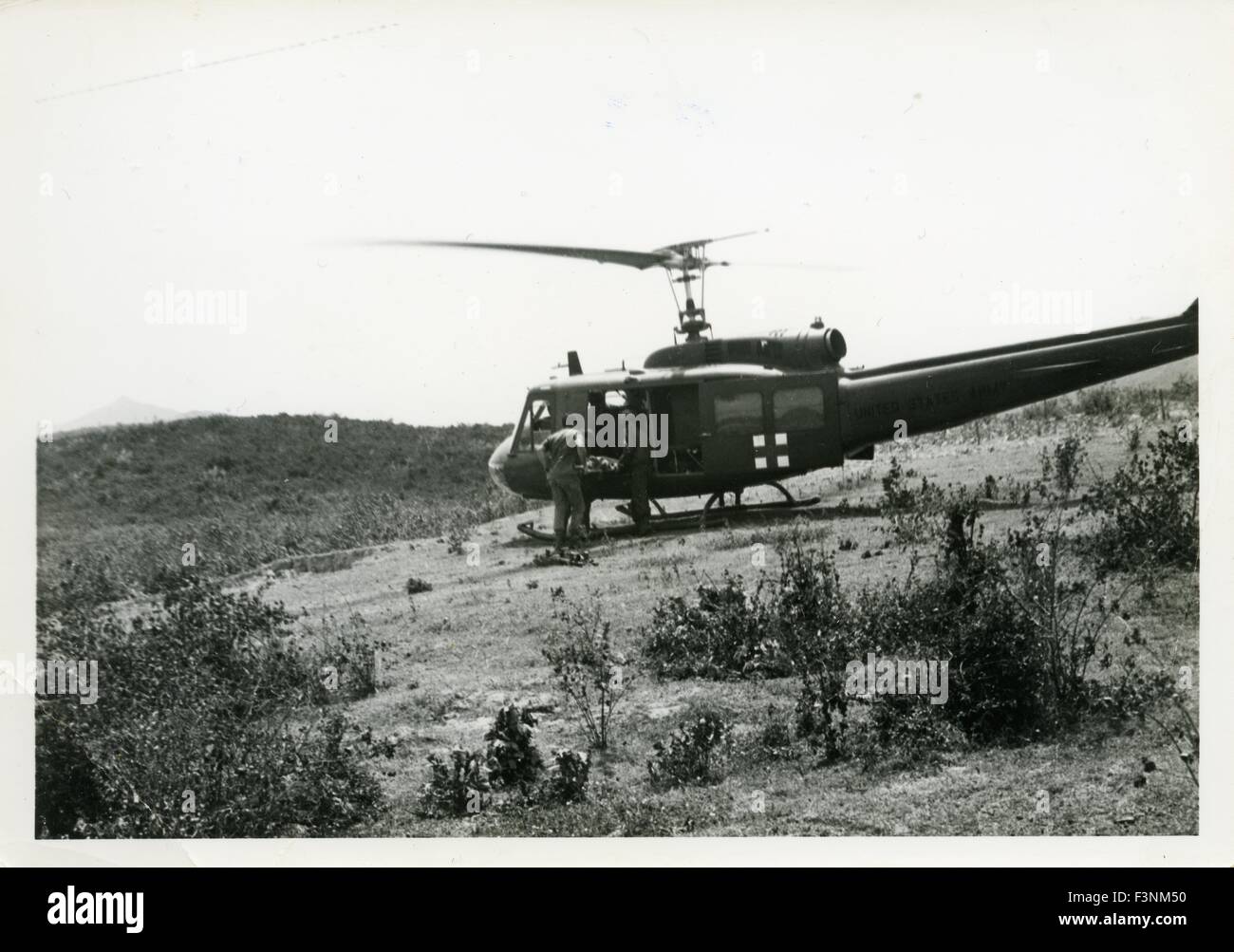 Wounded soldiers are loaded into a United States Army medevac dustoff ...