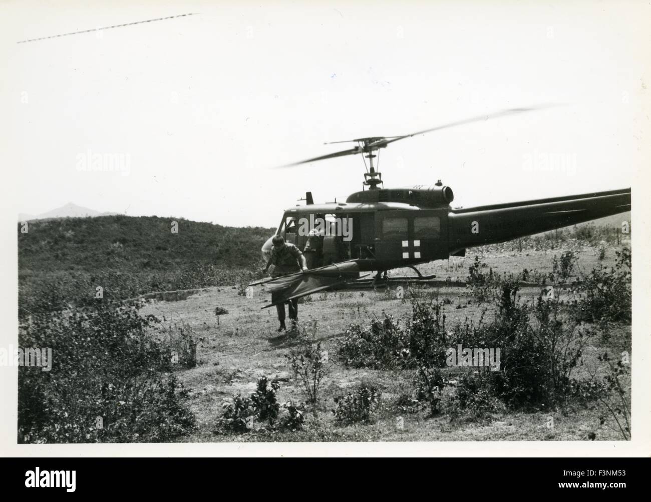 Wounded soldiers are loaded into a United States Army medevac dustoff ...