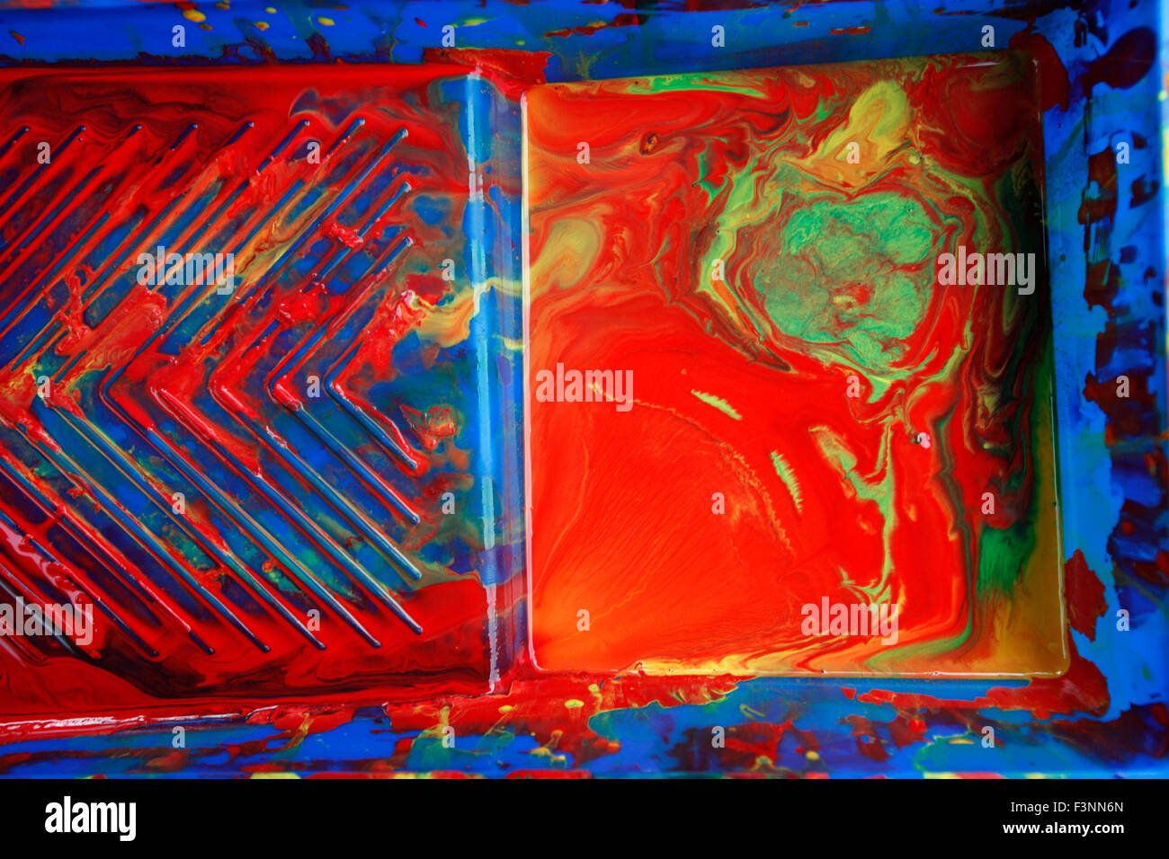 Tray with mixed watercolour paints enabling soaking and colouring of ...