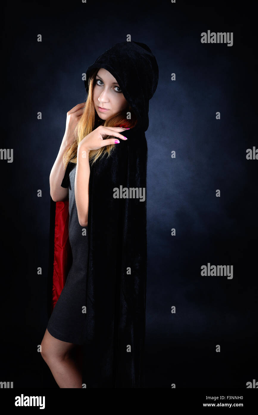 young woman in a mantle Stock Photo - Alamy