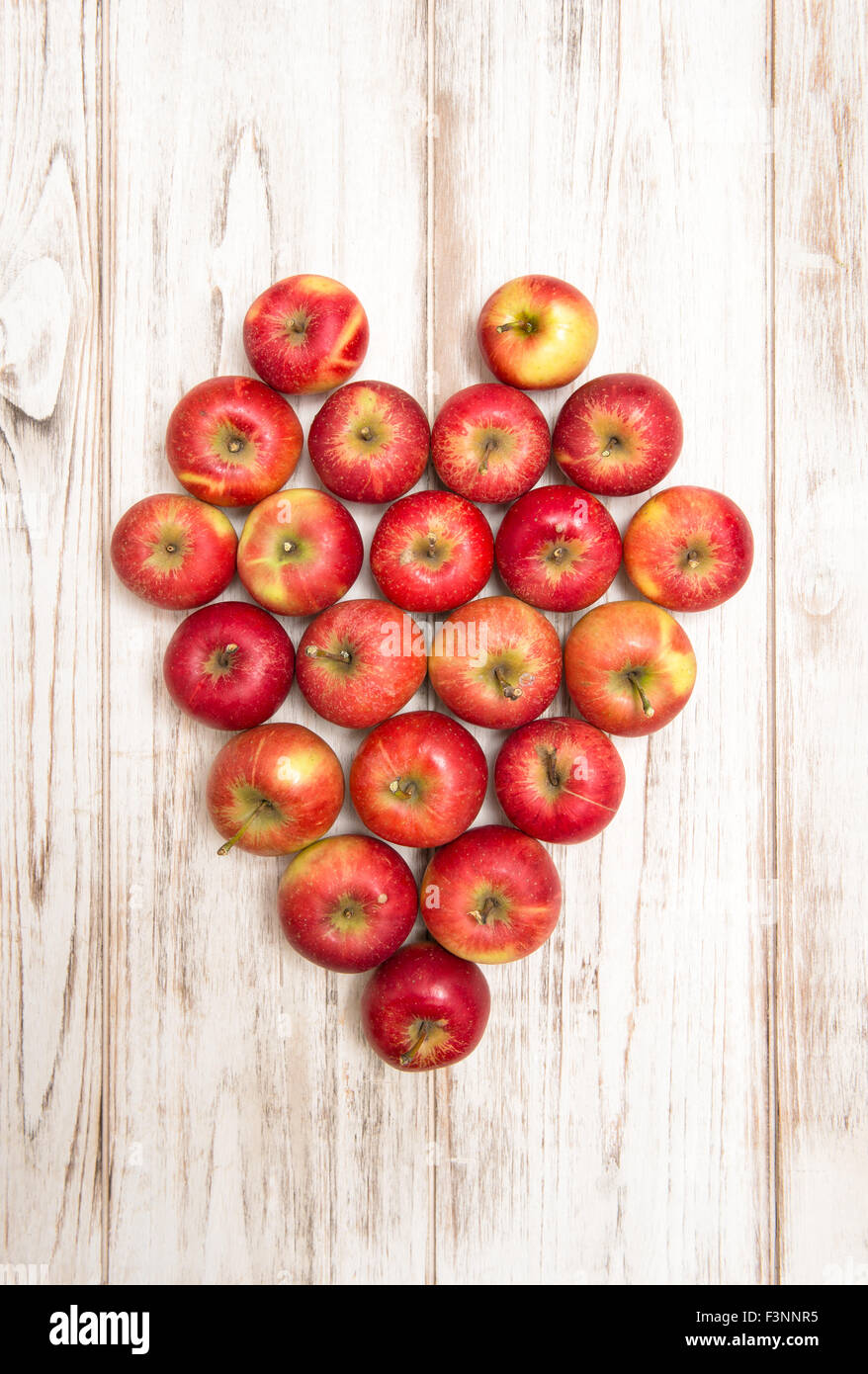 Apples heart over rustic wooden background. Love concept Stock Photo ...