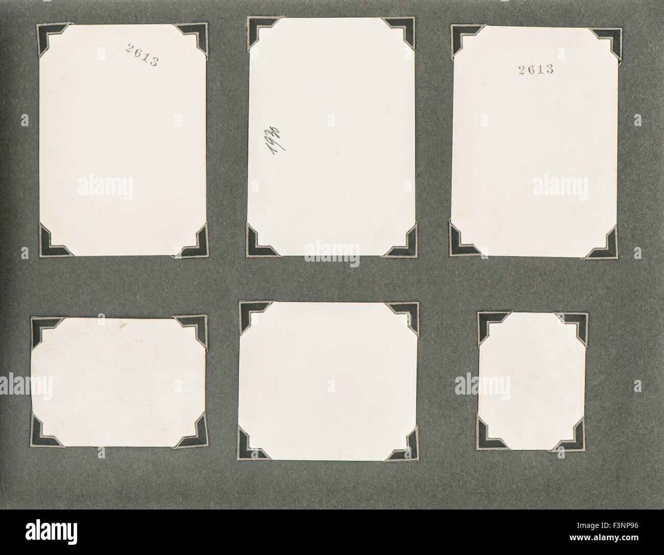 Old photo album page with corner over dark background. Paper texture ...