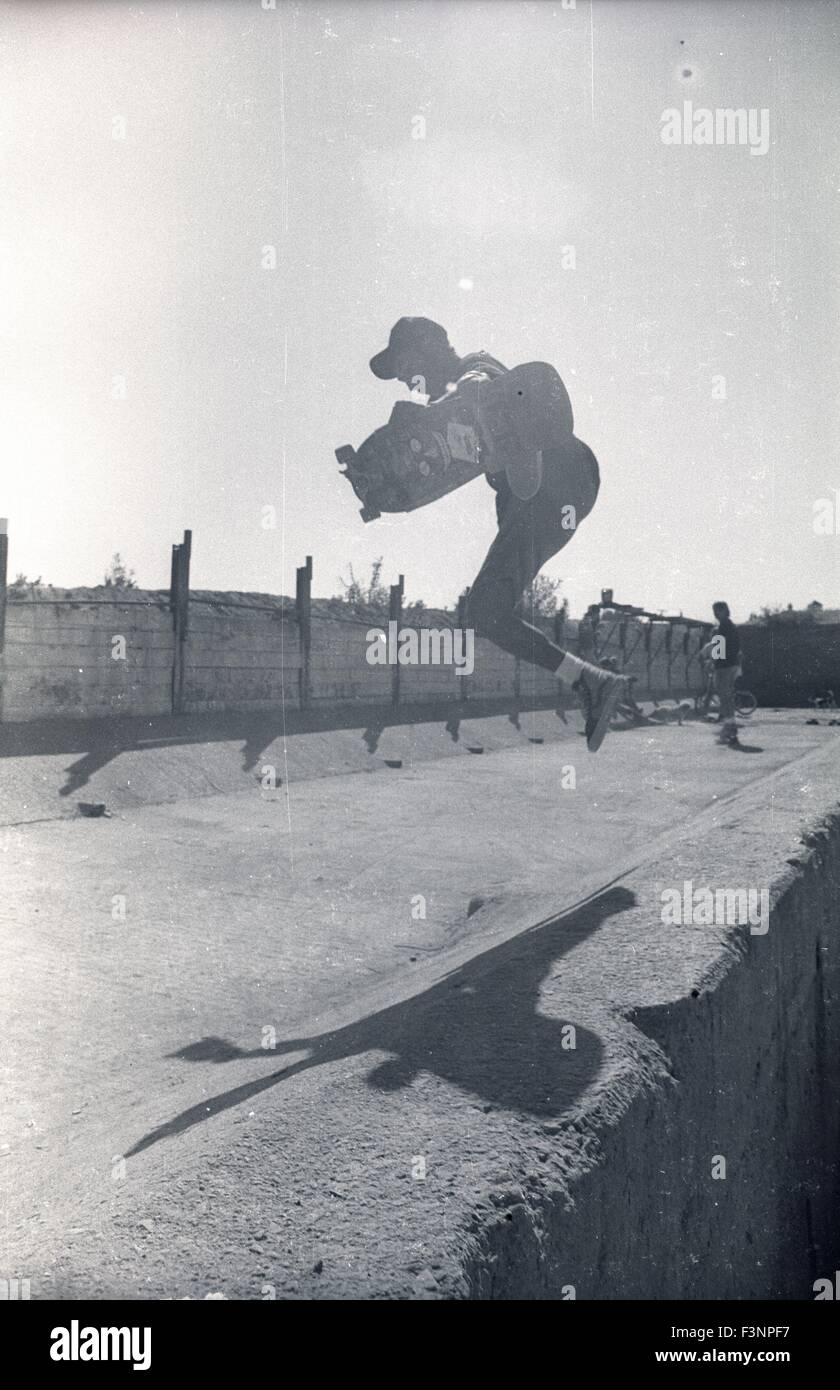 Skateboarding session in an irrigation control ditch near the Tule ...