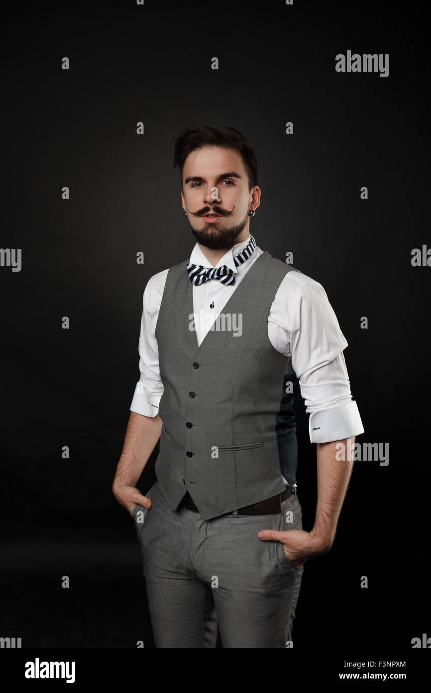 handsome guy with beard and mustache in suit Stock Photo - Alamy