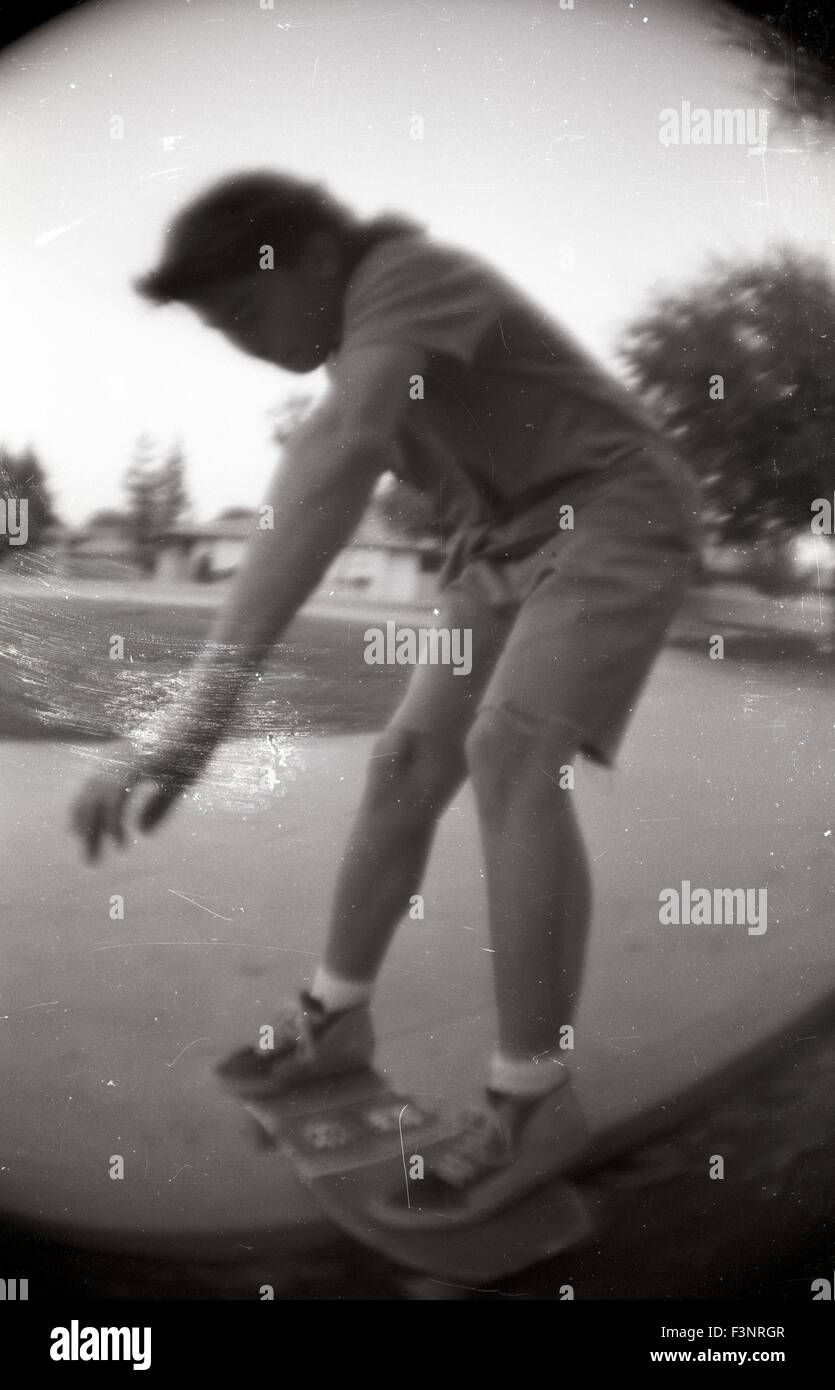 Skating on a sixteen foot half pipe in suburban neighborhood Stock ...