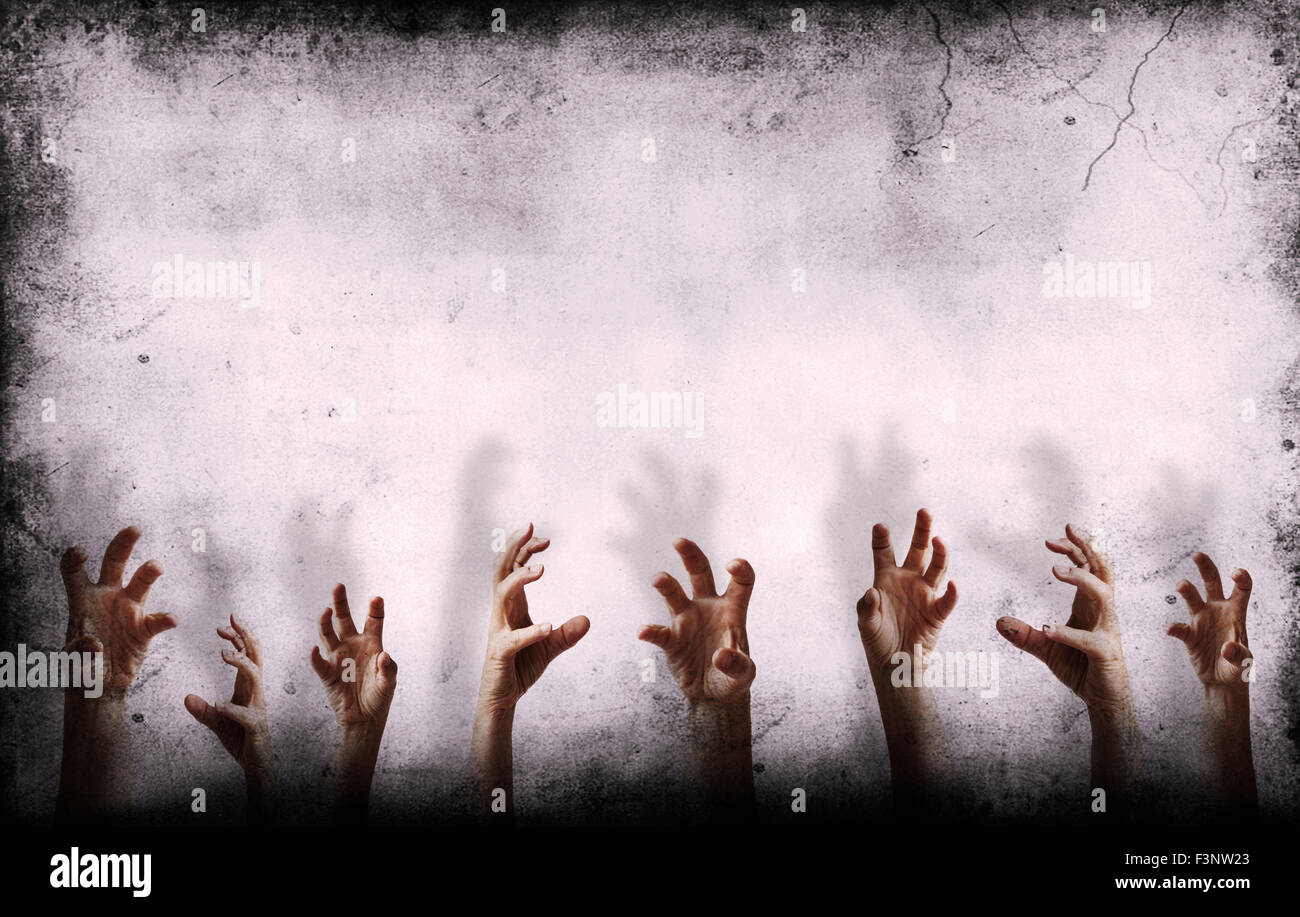 grungy wall with scary hands reaching out Stock Photo - Alamy
