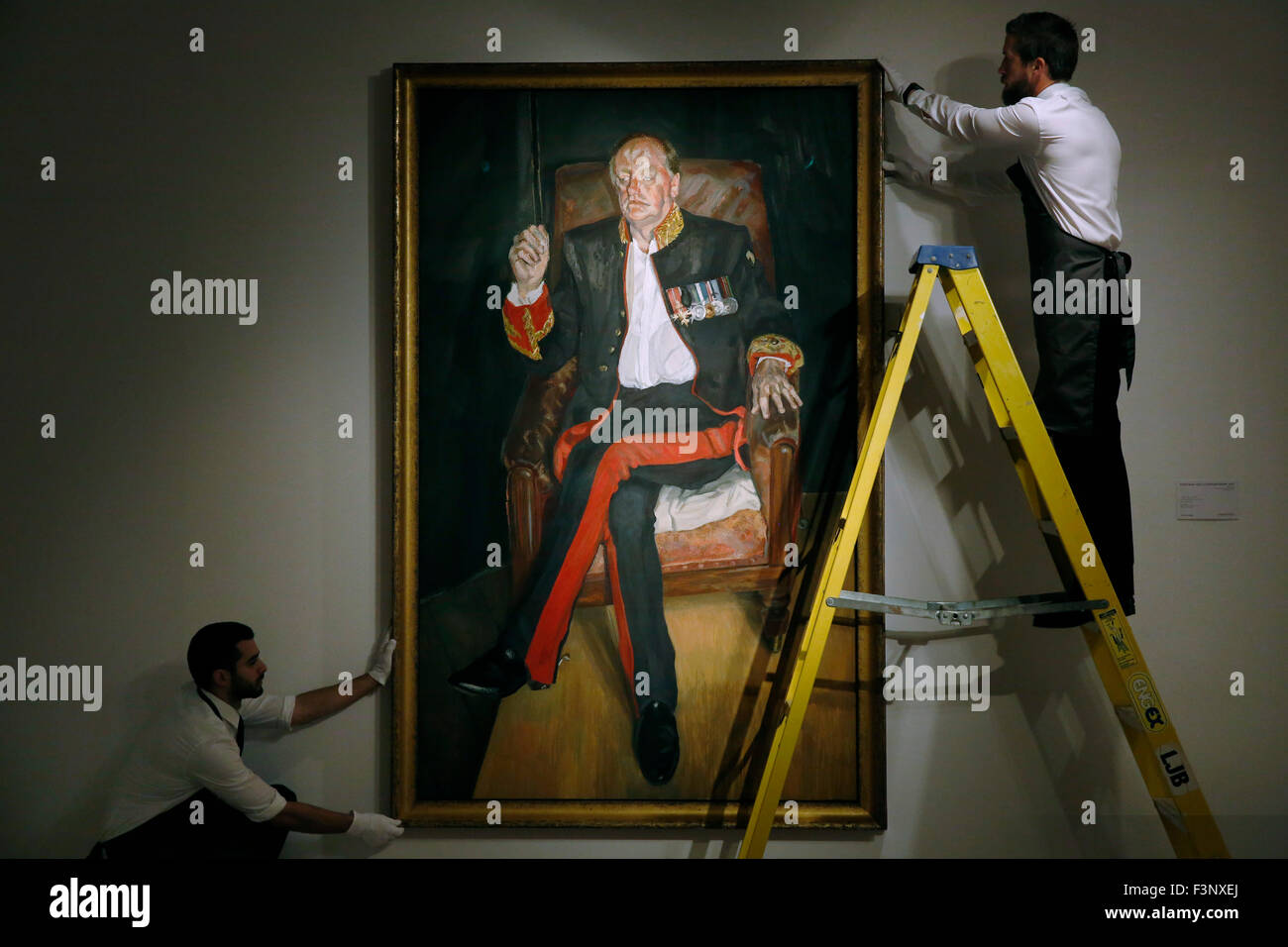 Christie's employees pose with Lucian Freud's "The Brigadier", a ...