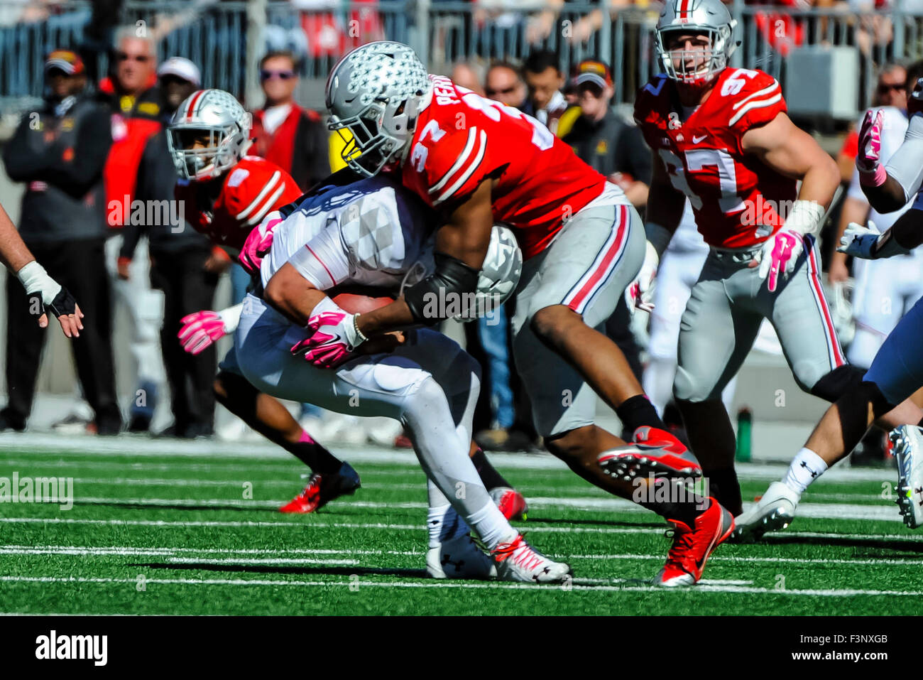 Linebacker Joshua Perry (37) of the Ohio State Buckeyes sacks ...