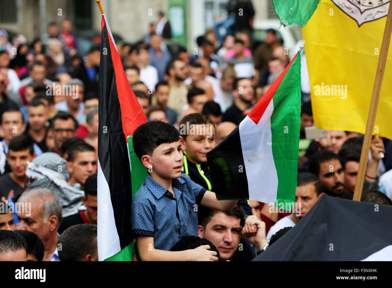 Palestinian children are seen carrying Palestinian flags during the ...