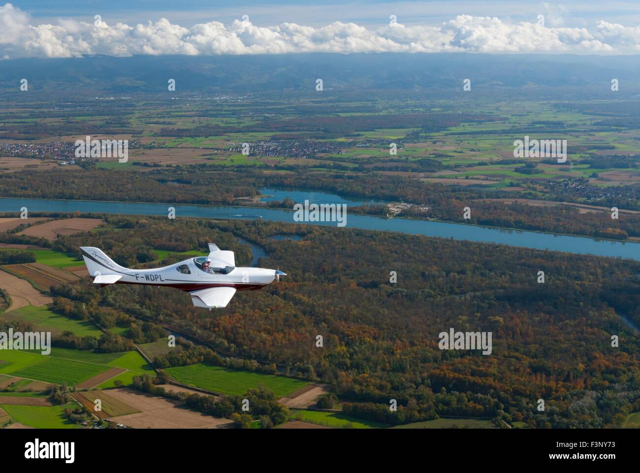 France, Bas Rhin (67), Aerospool Dynamic plane flying near Rhine river ...