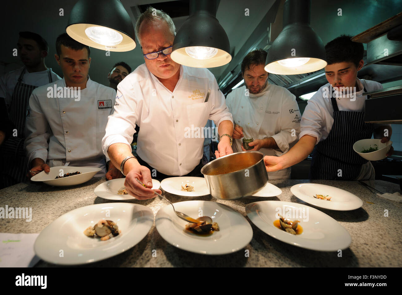 Male chef cooking gourmet dish hi-res stock photography and images - Alamy