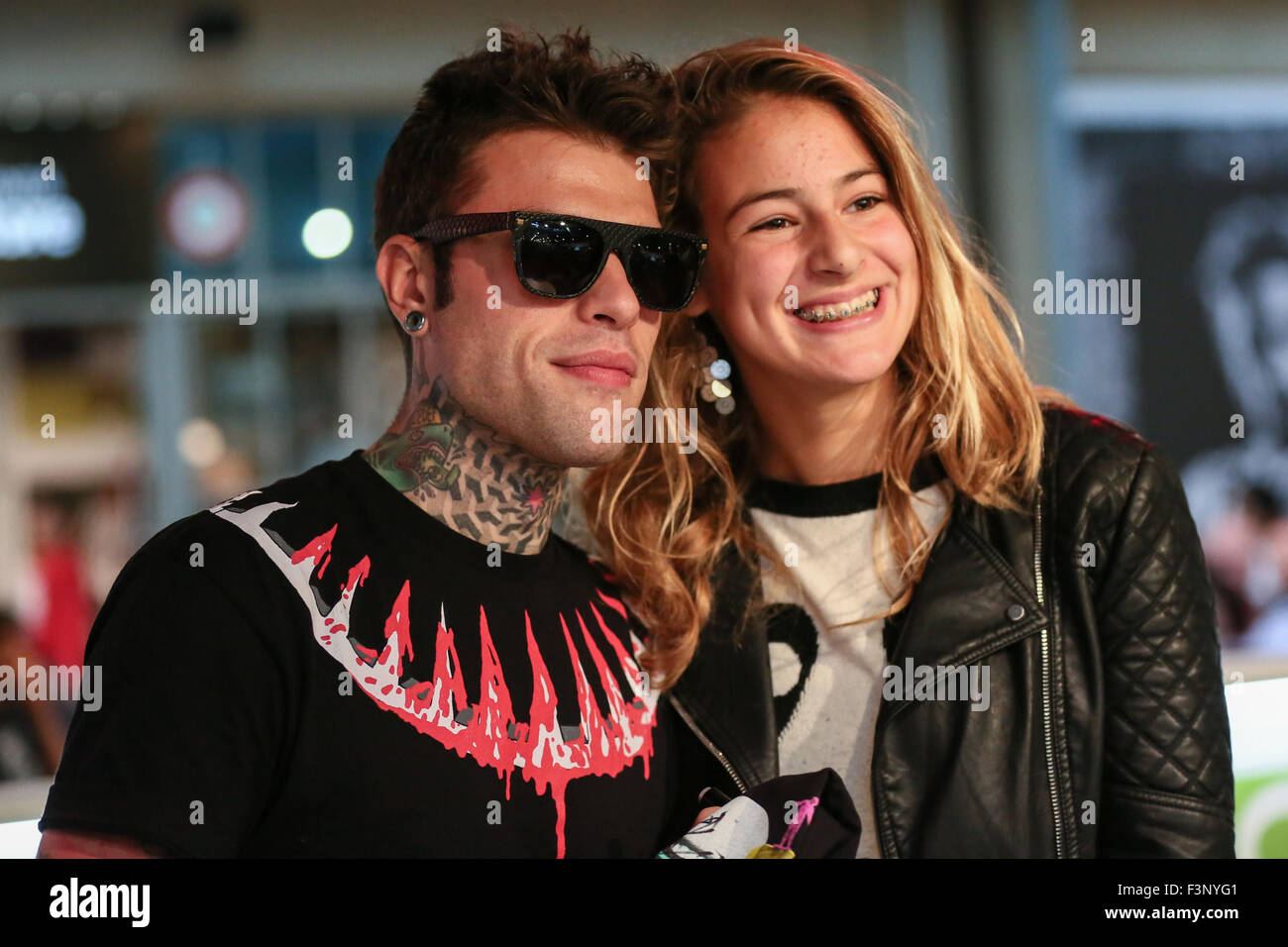 Turin, Italy. 10th Oct, 2015. Fedez poses a picture with his fan. The ...