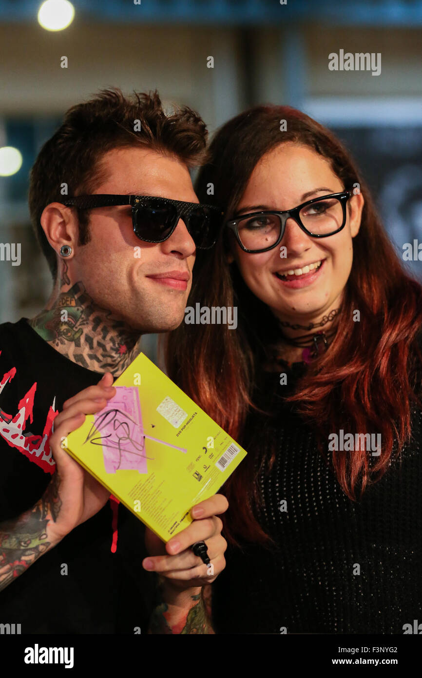 Turin, Italy. 10th Oct, 2015. Fedez show his album with his fan. The ...
