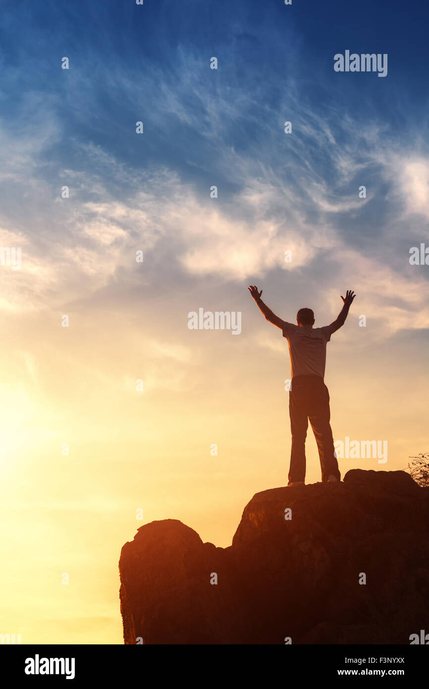 Man Silhouette Standing With Arms Up