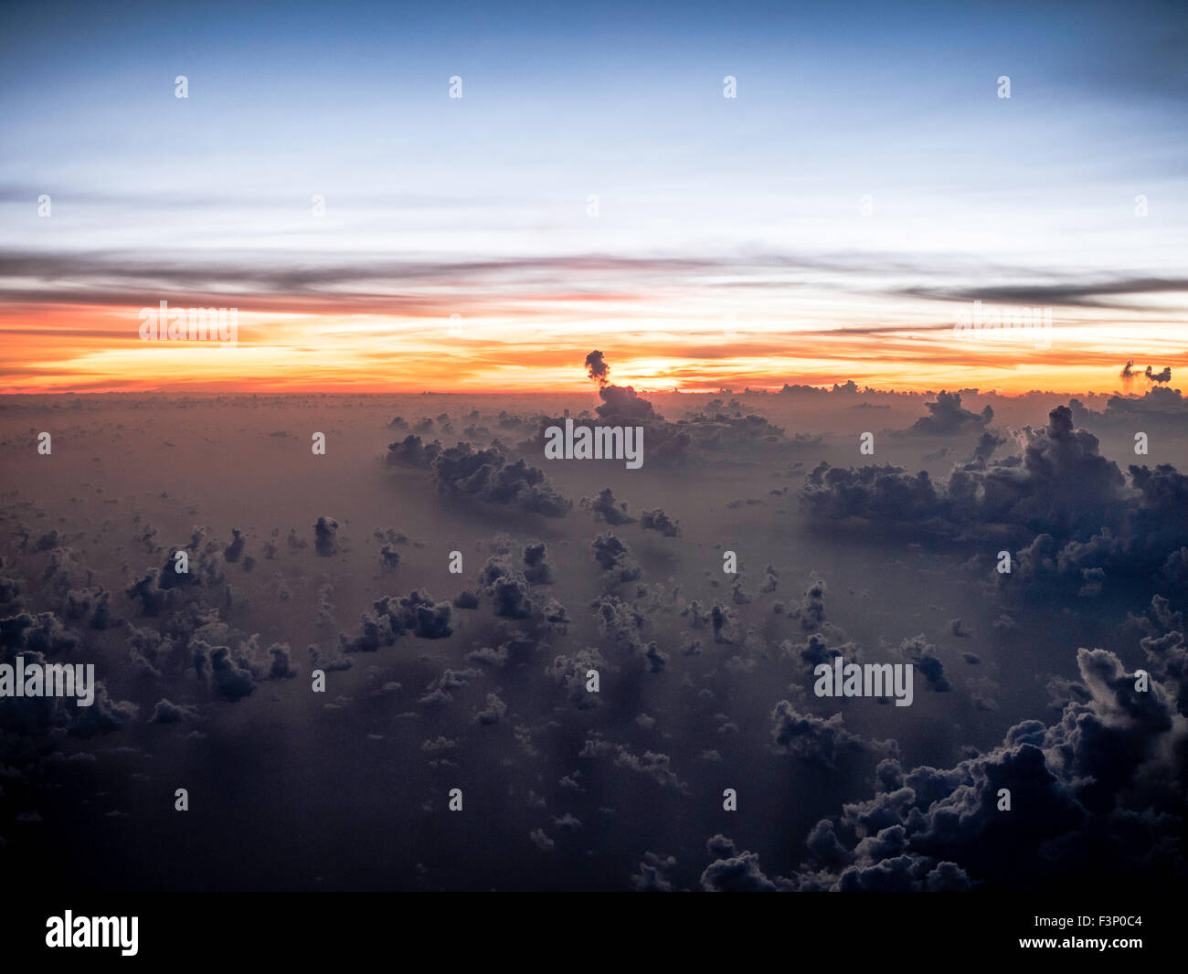 Sunset out airplane window Stock Photo - Alamy