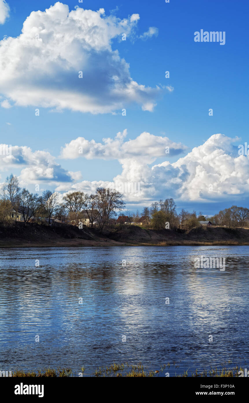 Spring river landscape with white clouds Stock Photo - Alamy