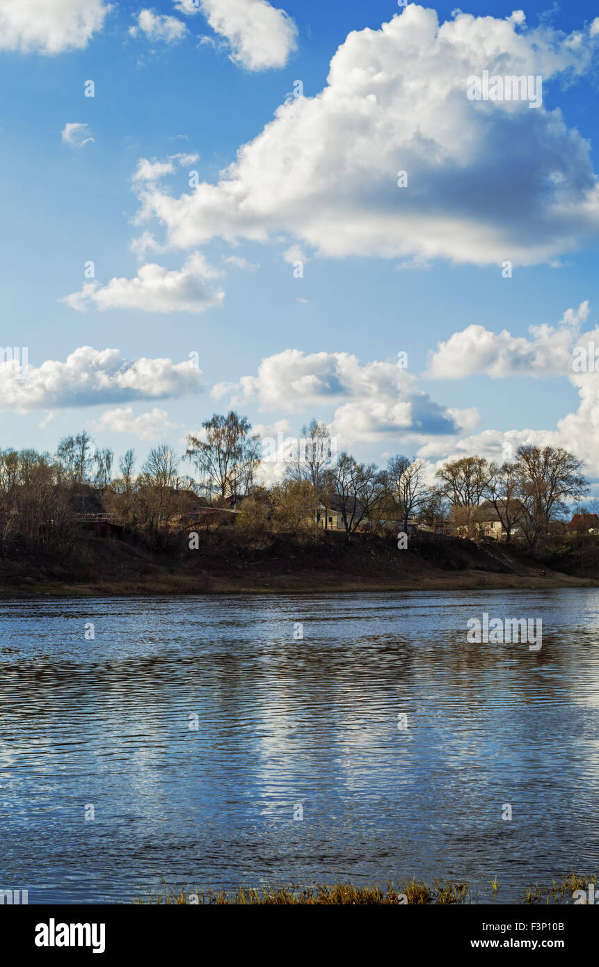 Spring river landscape with white clouds Stock Photo - Alamy