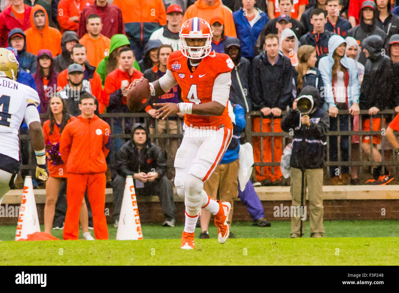 Clemson Tigers quarterback Deshaun Watson (4) rolls out looking to ...