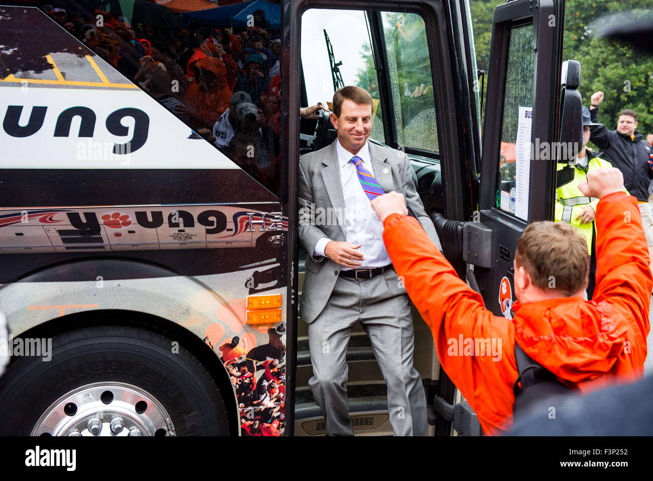 Clemson Tigers head coach Dabo Swinney steps off the bus for the start ...