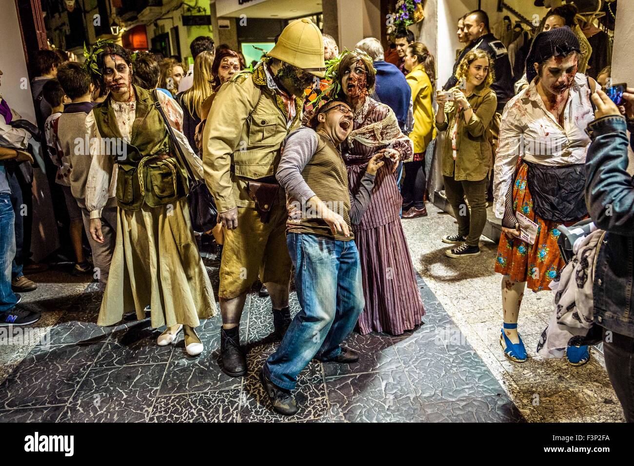 Sitges, Catalonia, Spain. 10th Oct, 2015. Zombies of all kind take part ...