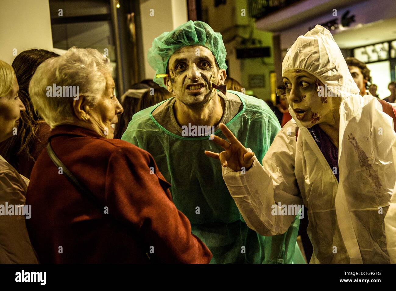 Sitges, Catalonia, Spain. 10th Oct, 2015. Some zombies an elderly lady ...