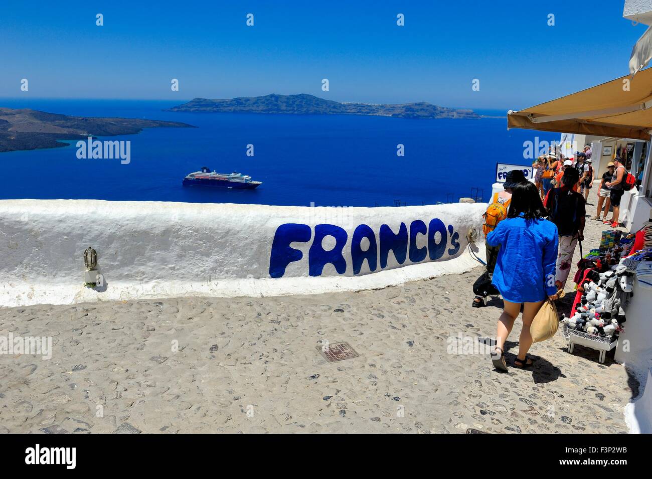 Tourists walking the caldera path in Fira Santorini Greece Stock Photo ...