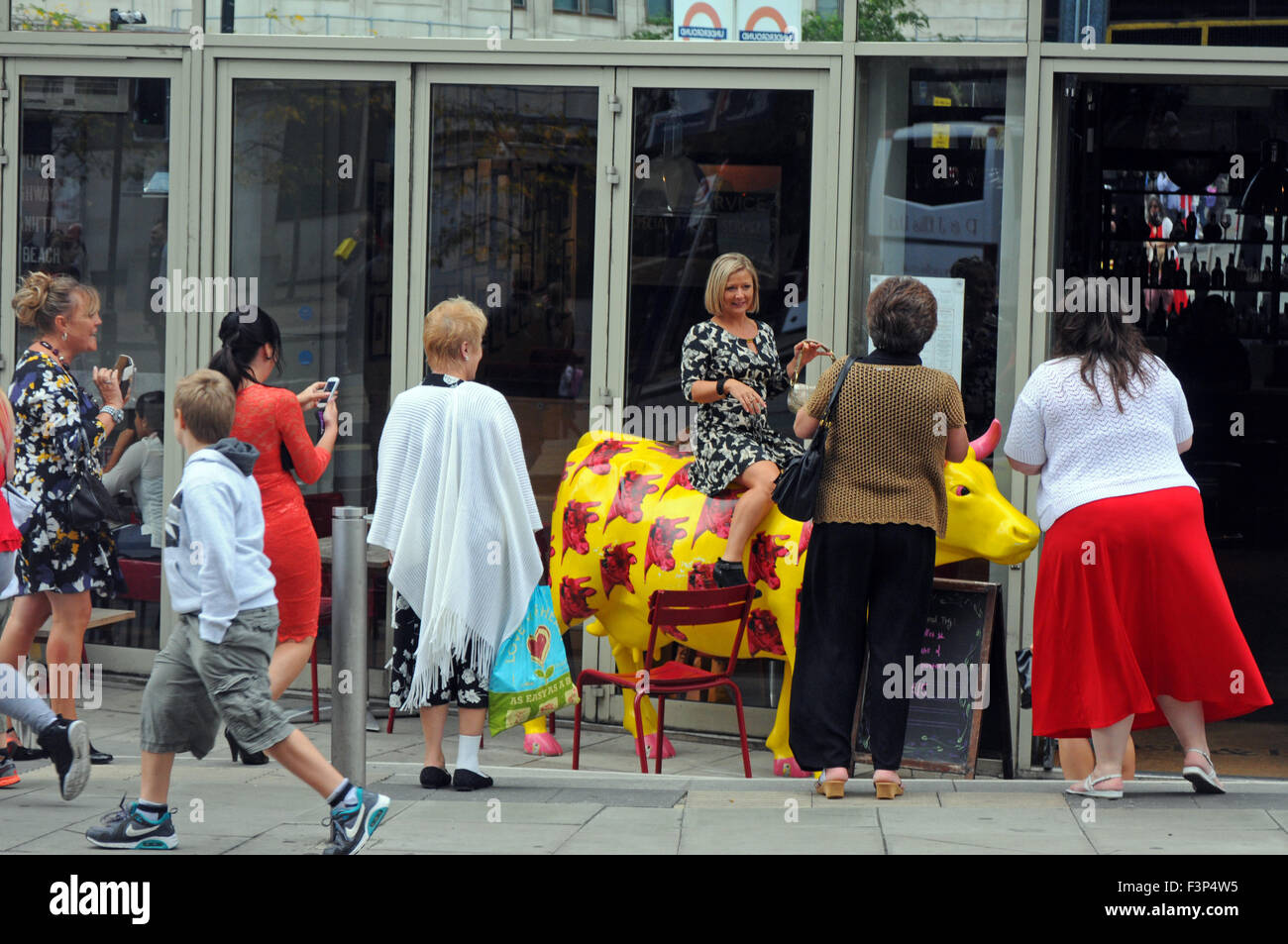 London, UK, 21 September 2014, Girls day out, high spirited one climbs ...
