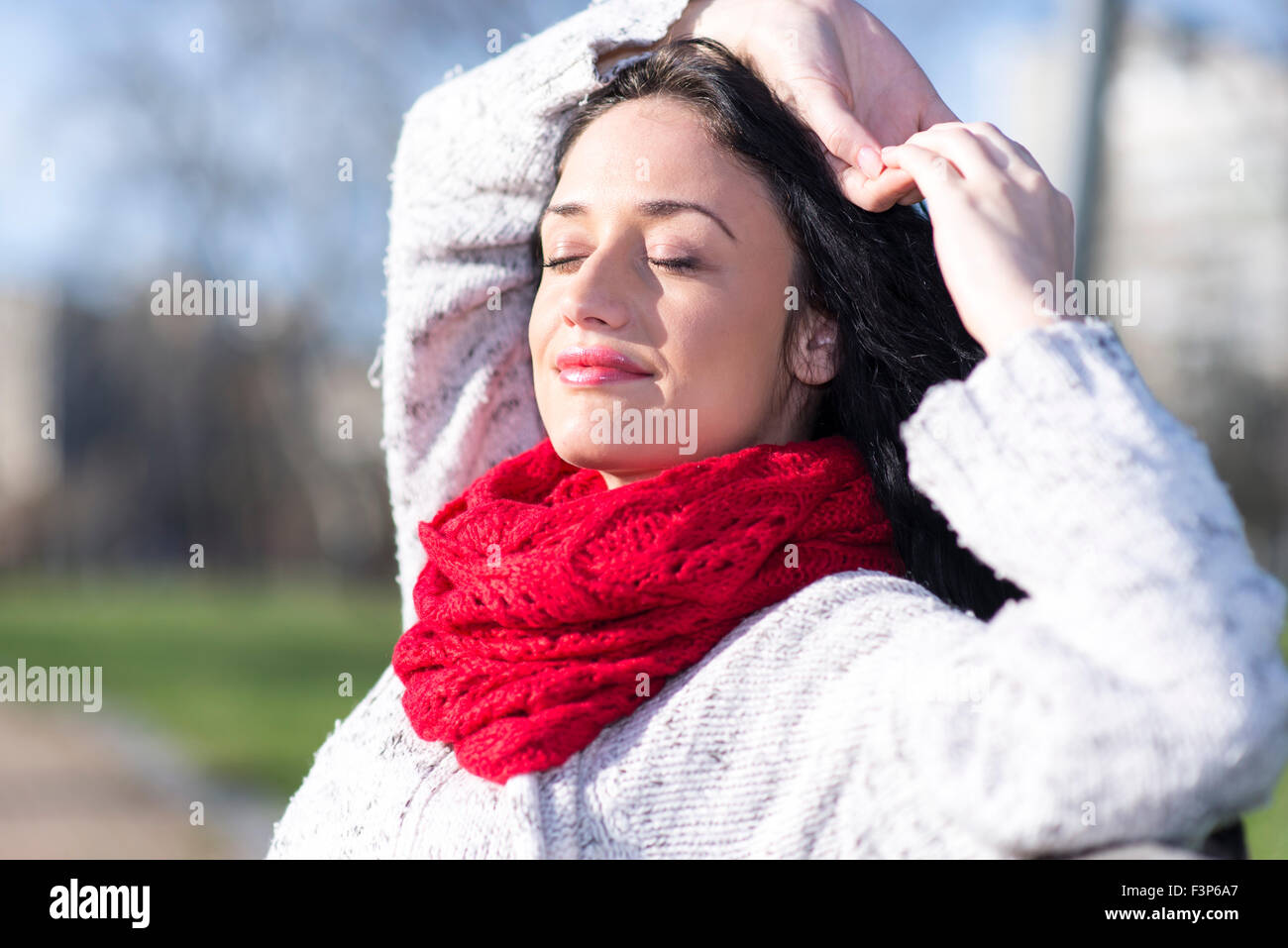 Young woman with red scarf Stock Photo - Alamy