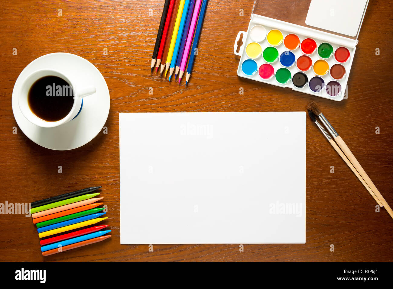 drawing tools on a table top view and a blank sheet of paper Stock ...