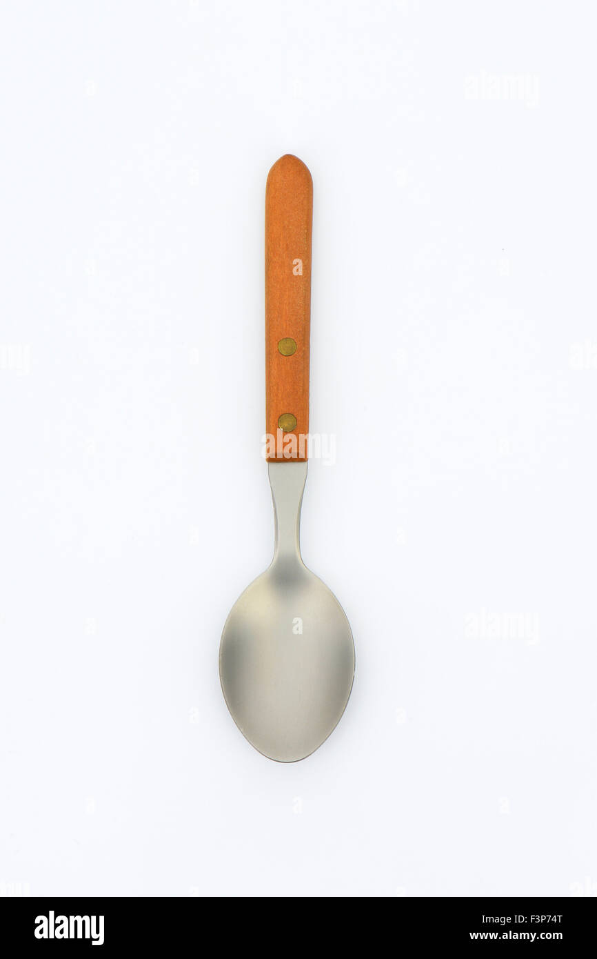 empty spoon with wooden handle on white background Stock Photo - Alamy