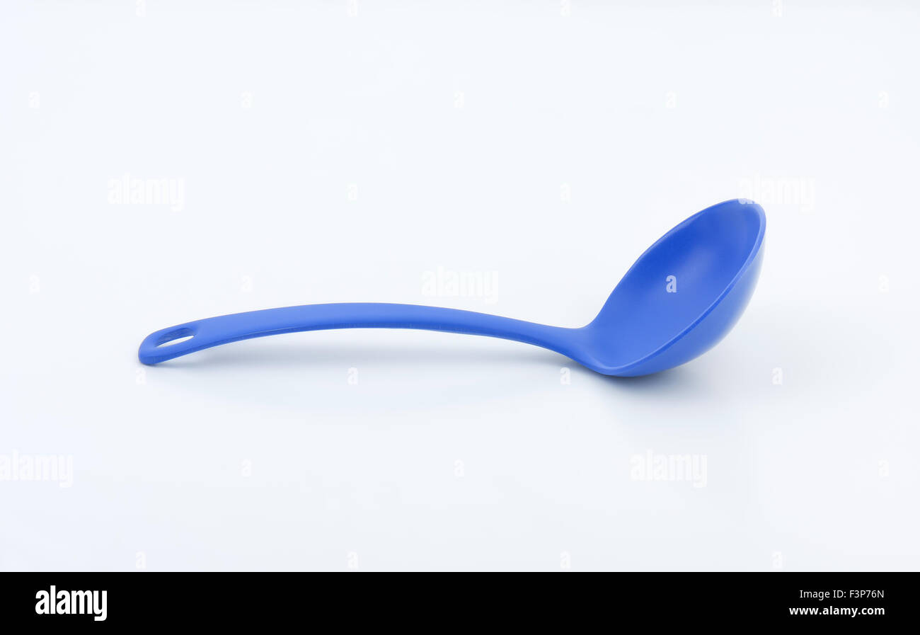 blue ladle on white background Stock Photo - Alamy