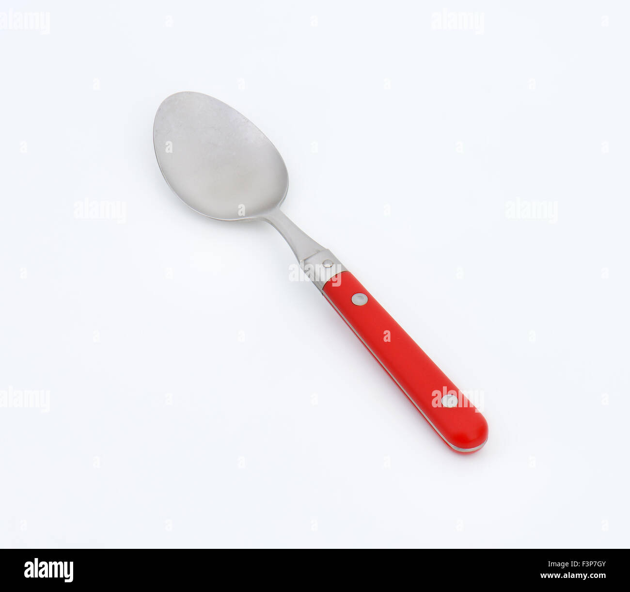 empty spoon with red wooden handle on white background Stock Photo - Alamy