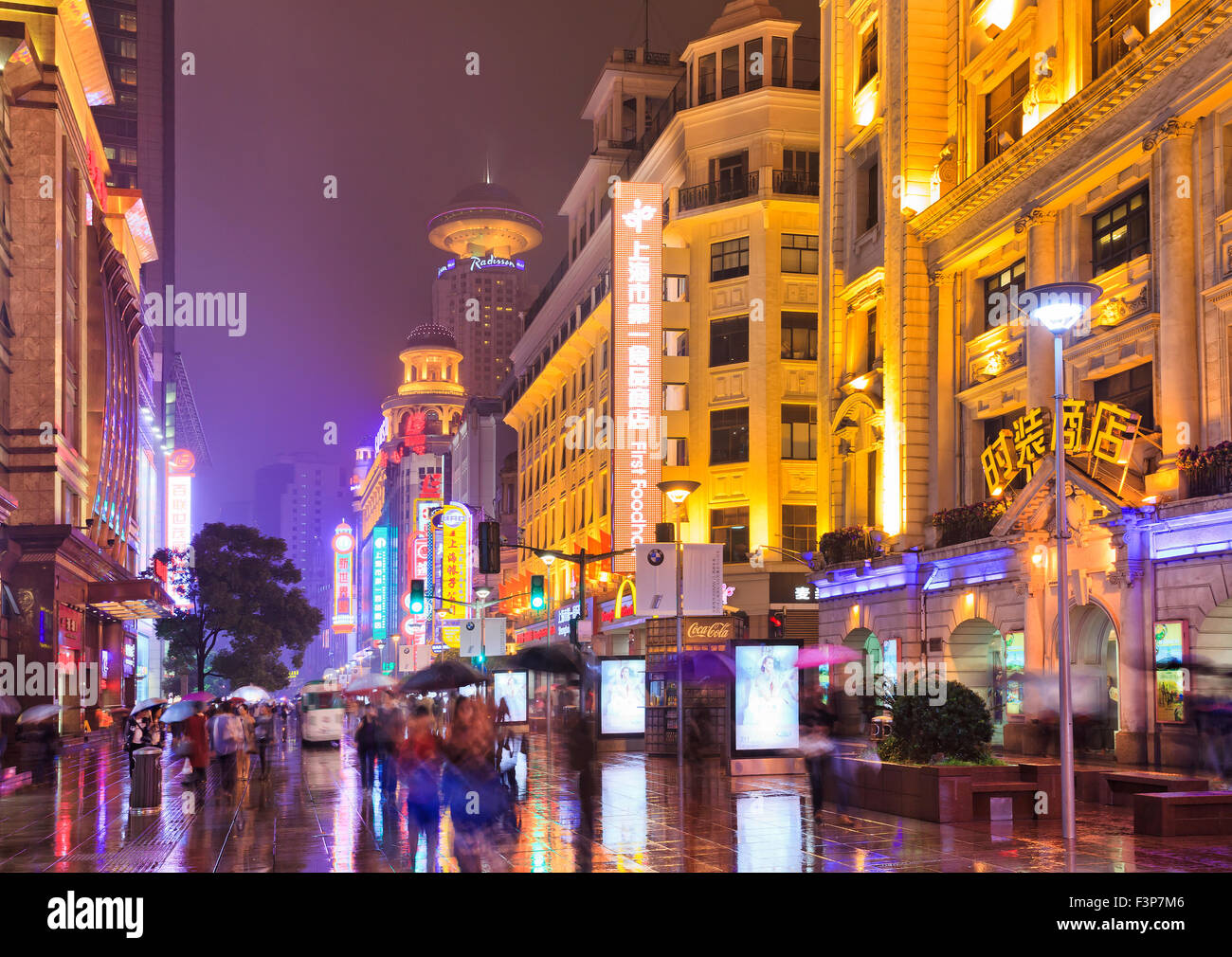 pedestrian walking shopping Nanking road street in Shanghai, China, at ...