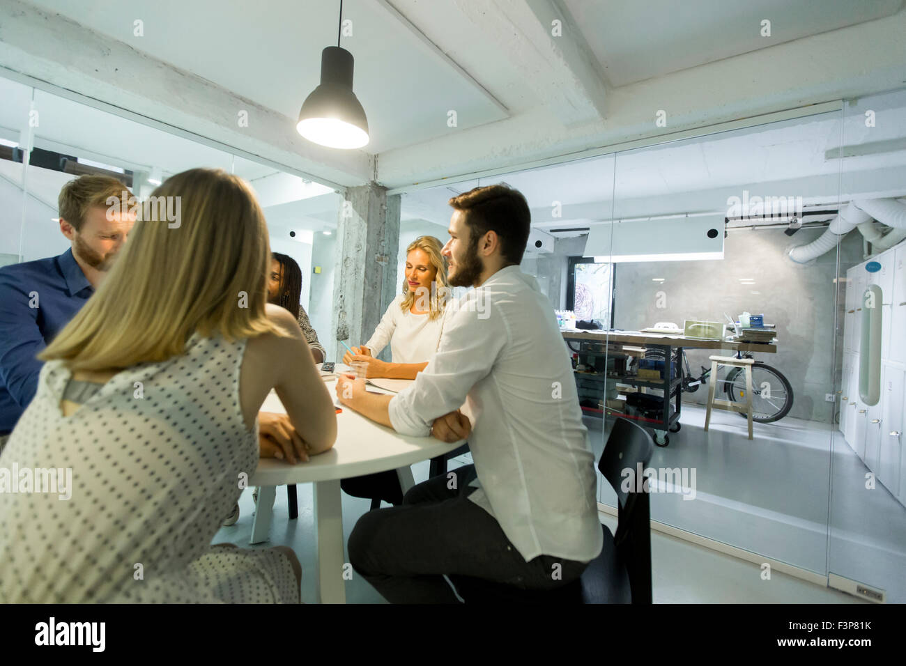 Young people in the office Stock Photo - Alamy
