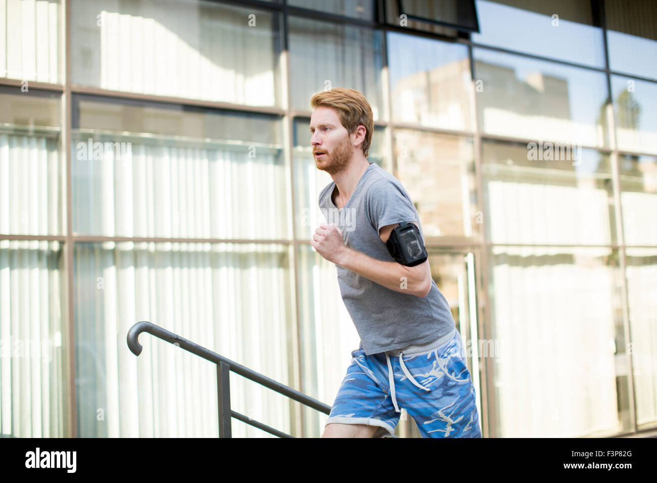 Running male urban hi-res stock photography and images - Alamy