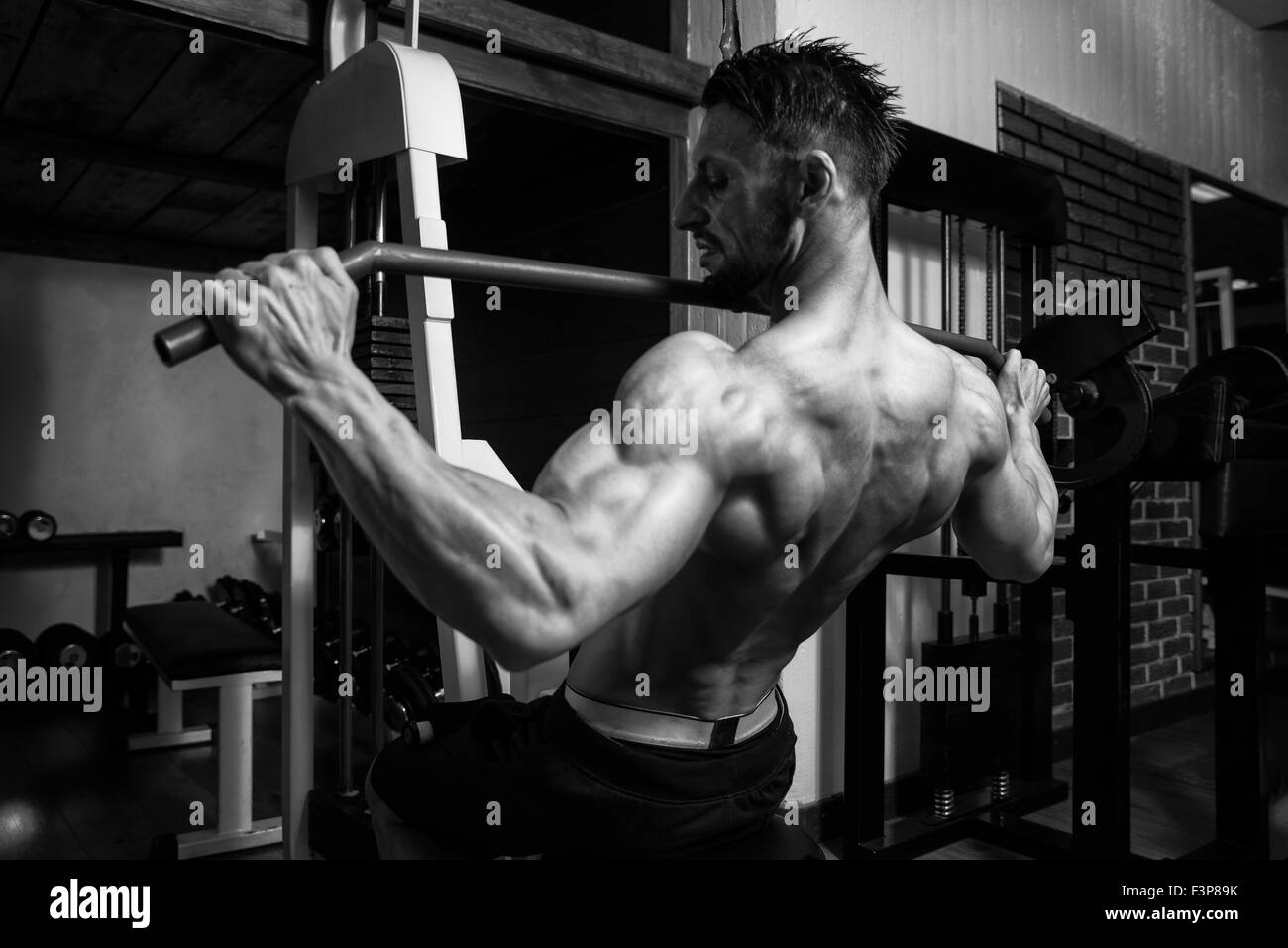 Bodybuilder Doing Heavy Weight Exercise For Back Stock Photo - Alamy