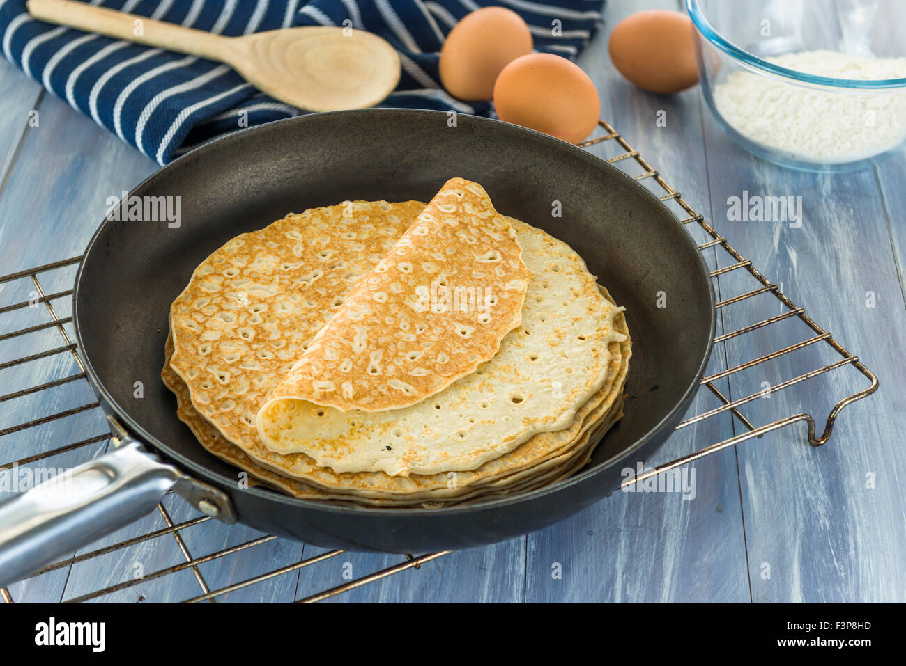A stack of pancakes on frying pan Stock Photo - Alamy