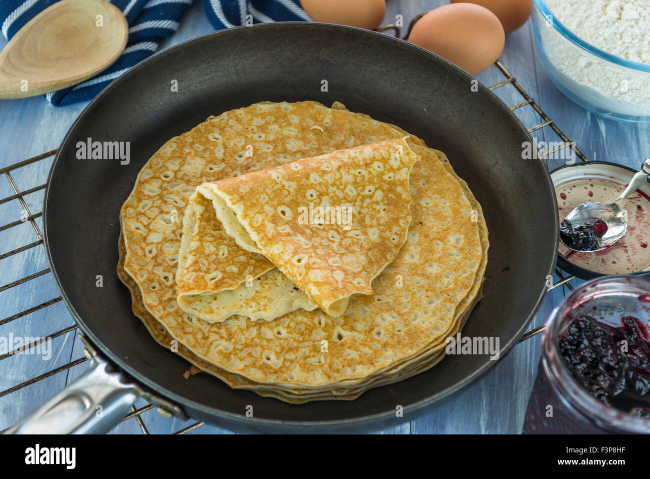A stack of pancakes on frying pan Stock Photo - Alamy