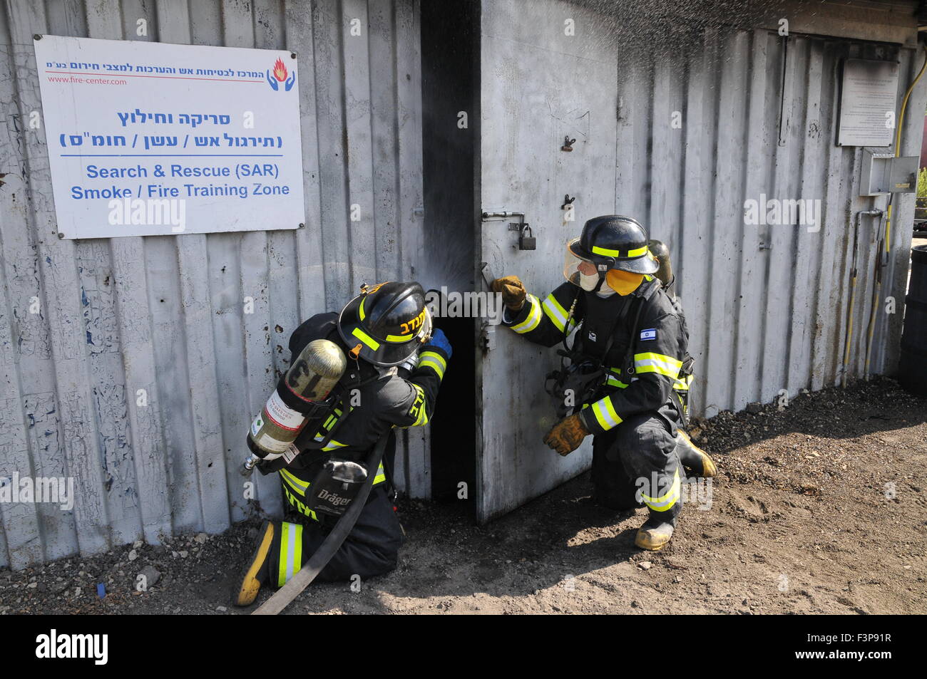 Firefighters protective clothing hi-res stock photography and images ...