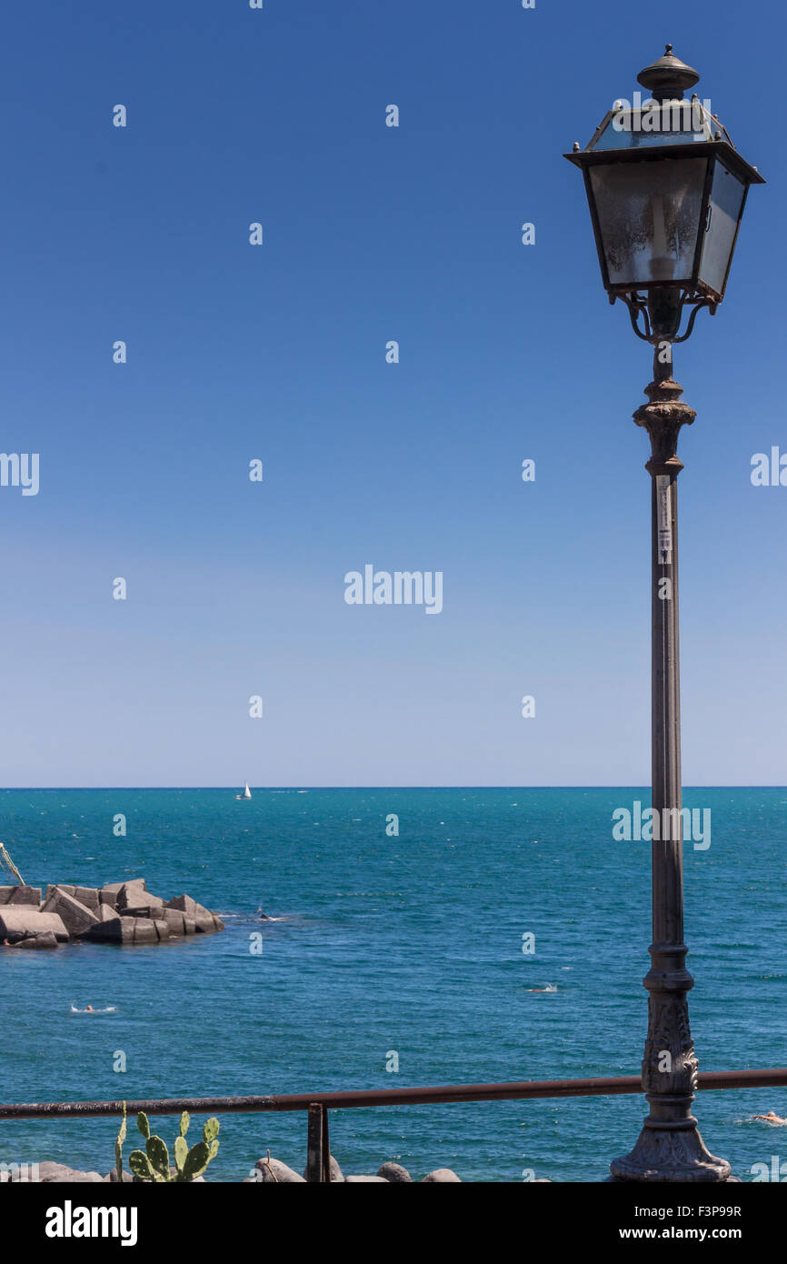 The street lamp on mediterranean sea background Stock Photo - Alamy