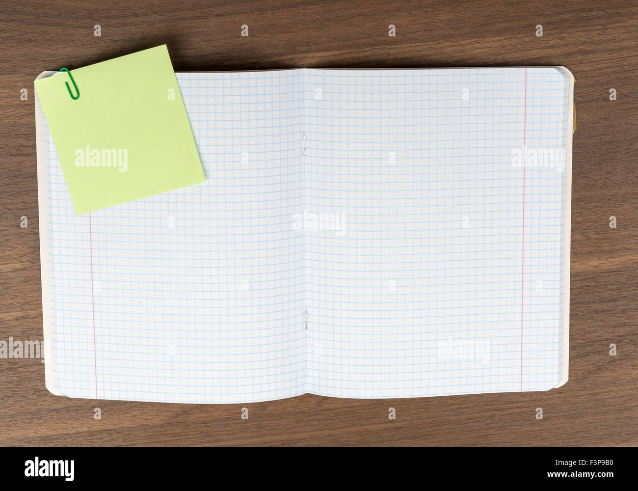 Open copybook on table Stock Photo - Alamy