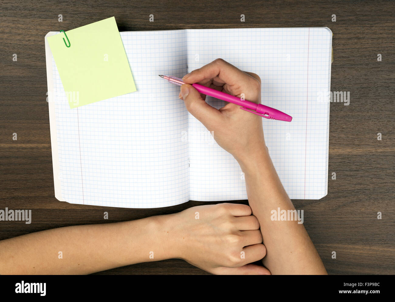 Woman calculator wooden table hi-res stock photography and images - Alamy