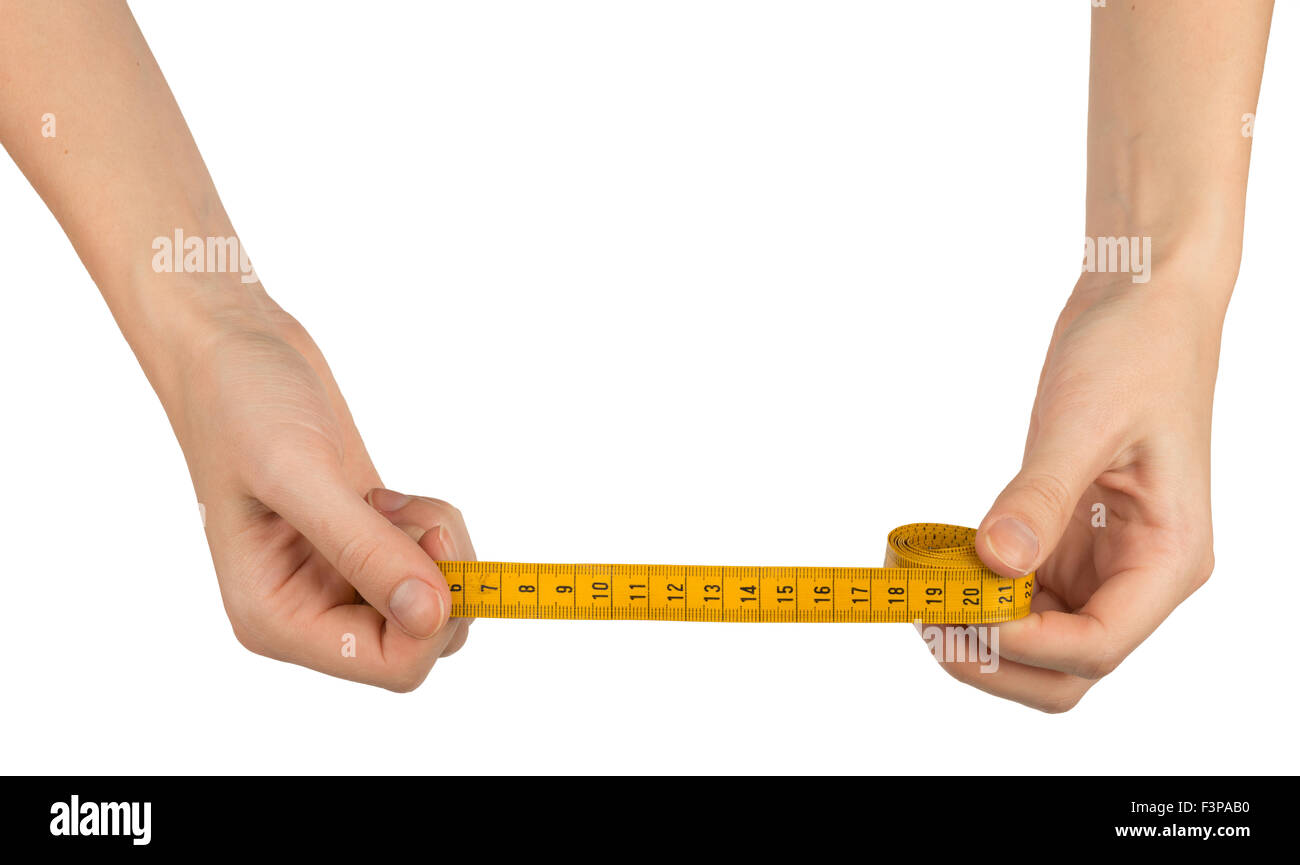Humans arms holding tape measure Stock Photo - Alamy