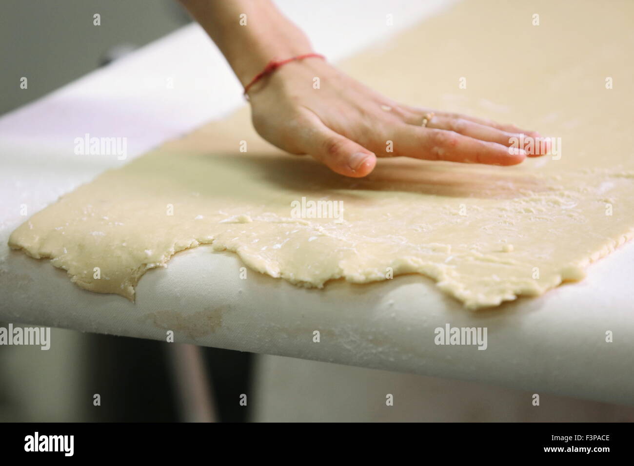 Making dough hands bakery production hi-res stock photography and ...