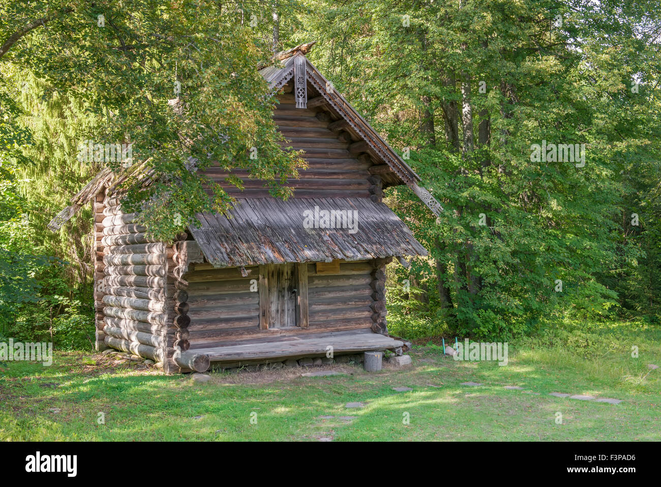 Two storey barn with a canopy from the 19th century. Vasilevo, Tver ...