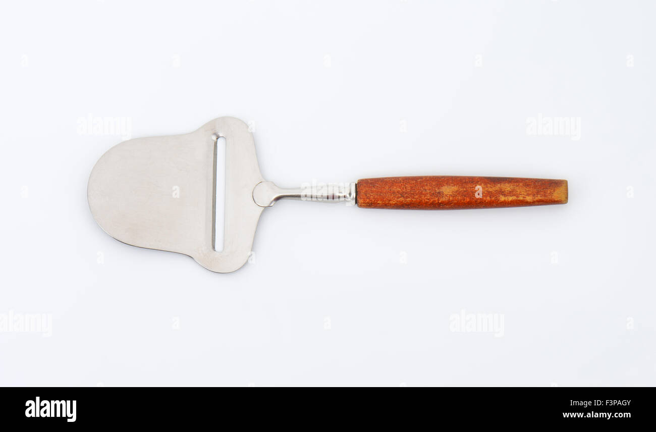 cheese cutter with wooden handle on white background Stock Photo - Alamy
