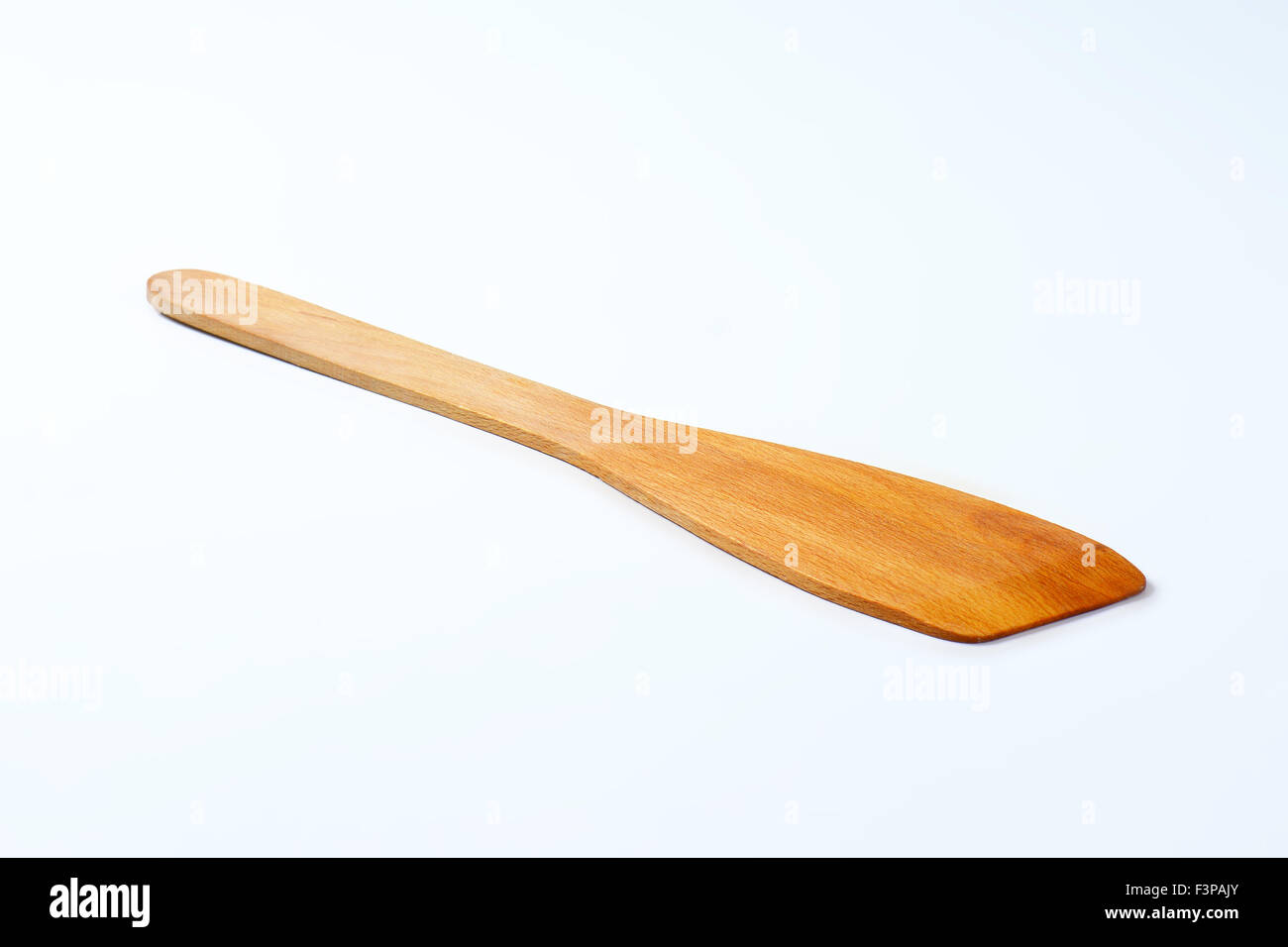 wooden spatula on white background Stock Photo - Alamy