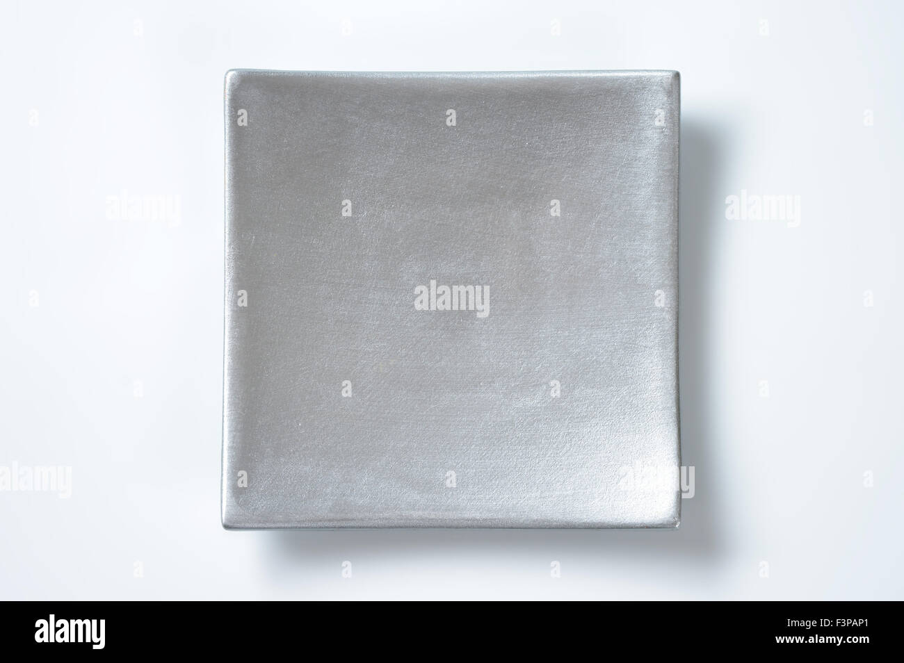 silver square plate on white background Stock Photo - Alamy