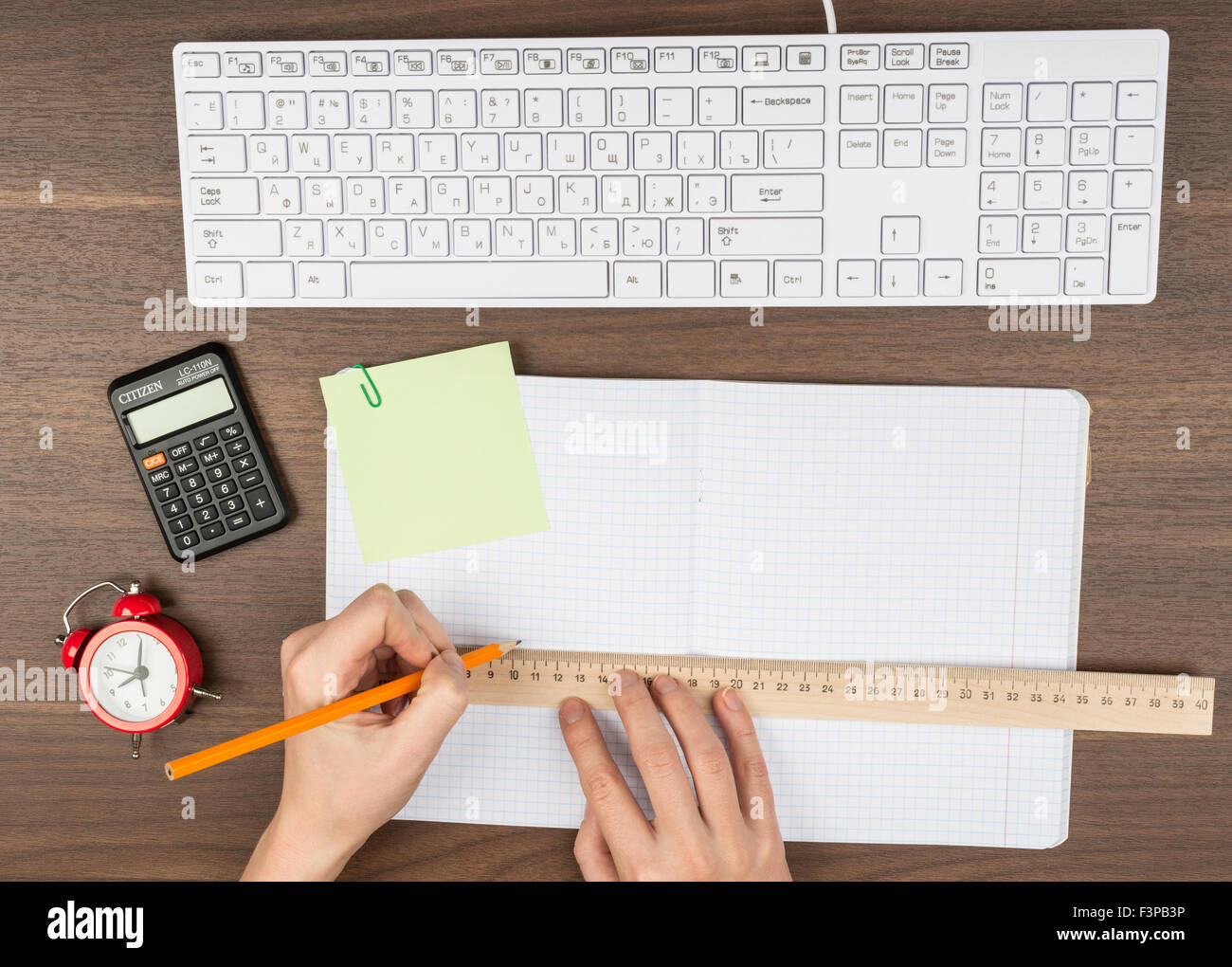 Humans hands with ruler Stock Photo - Alamy